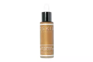 NutriBronze Adaptive Sheer Tinted Serum 60 deur Oskia Die glinsterende serum smelt in die gesig en laat 'n dou ...