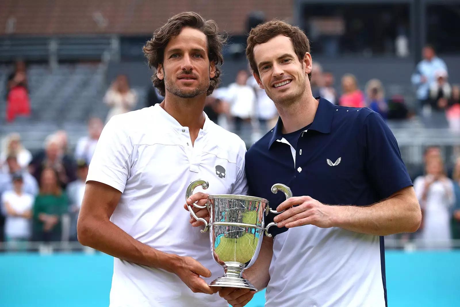 Andy Murray og Feliciano Lopez eftir sigur í tvíliðaleik karla á FeverTree meistaramótinu í Queens Club 2019